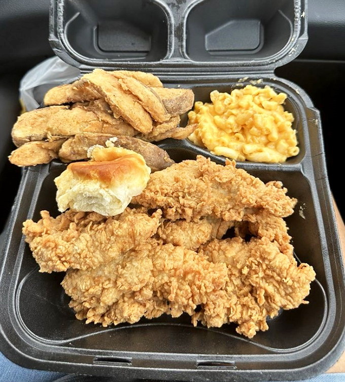 The takeout box that turns your car into the best restaurant in town. Crispy tenders, mac and cheese, and a biscuit—the holy trinity.