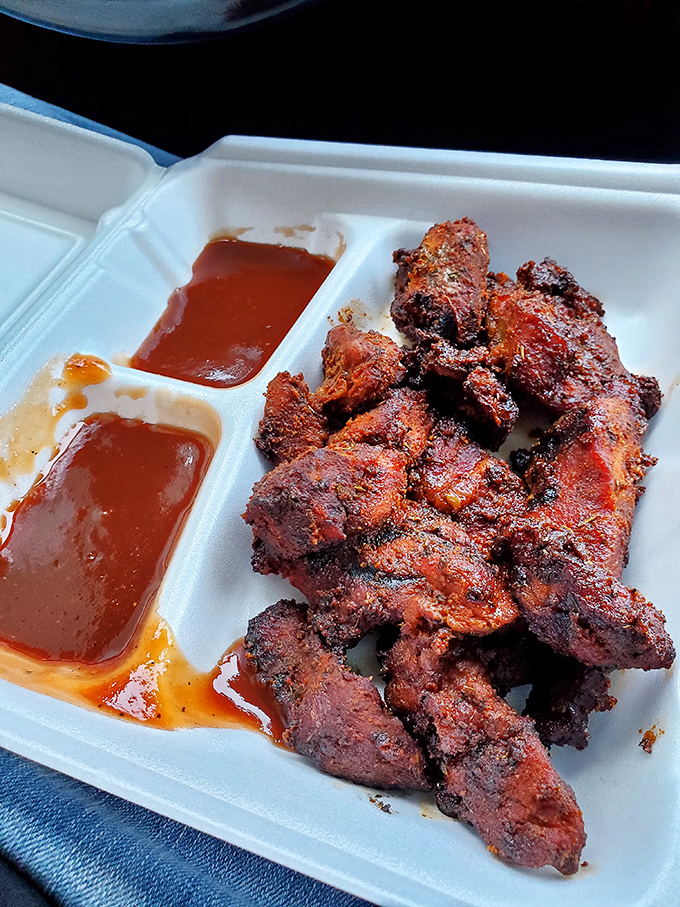 These chicken wings aren't trying to win any beauty contests, but they've got a PhD in flavor. Two sauces because choosing just one would be cruel.