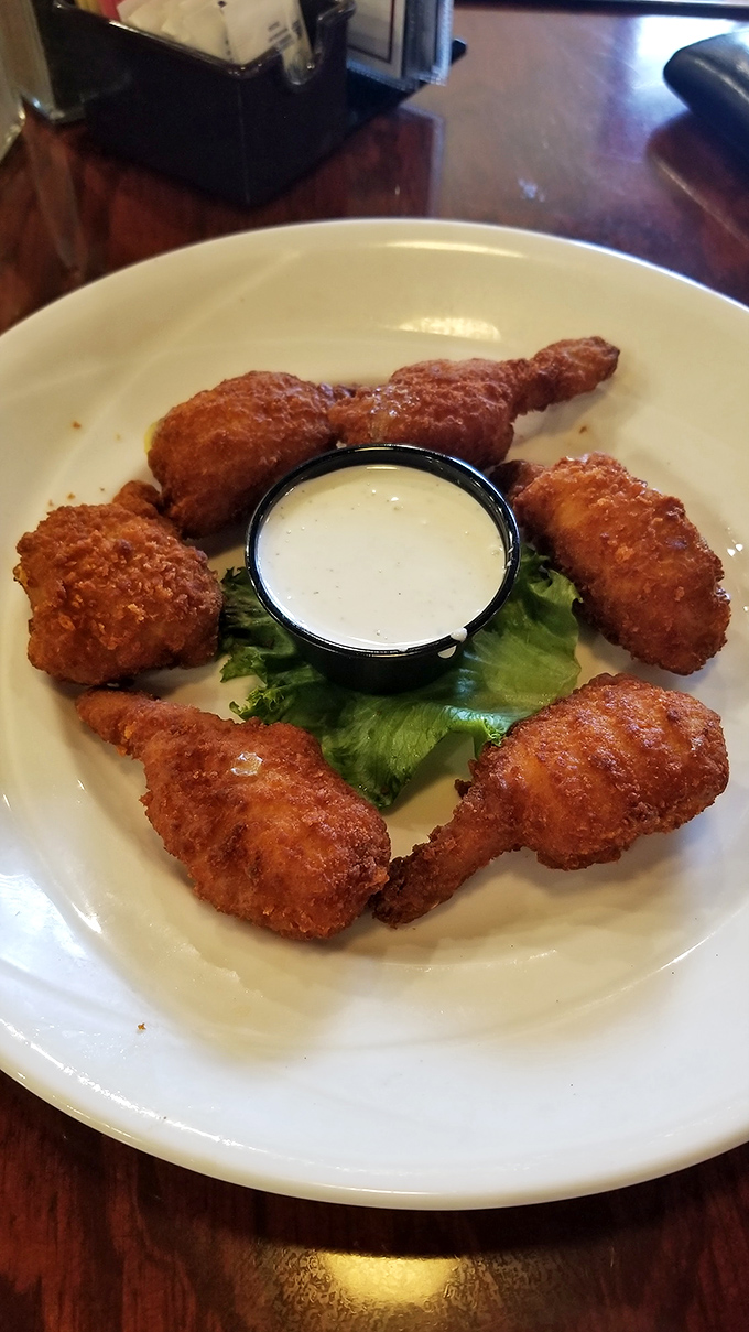 These chicken wings aren't just fried, they're transformed&mdash;crispy on the outside, juicy within, and served with a dipping sauce worth bottling.