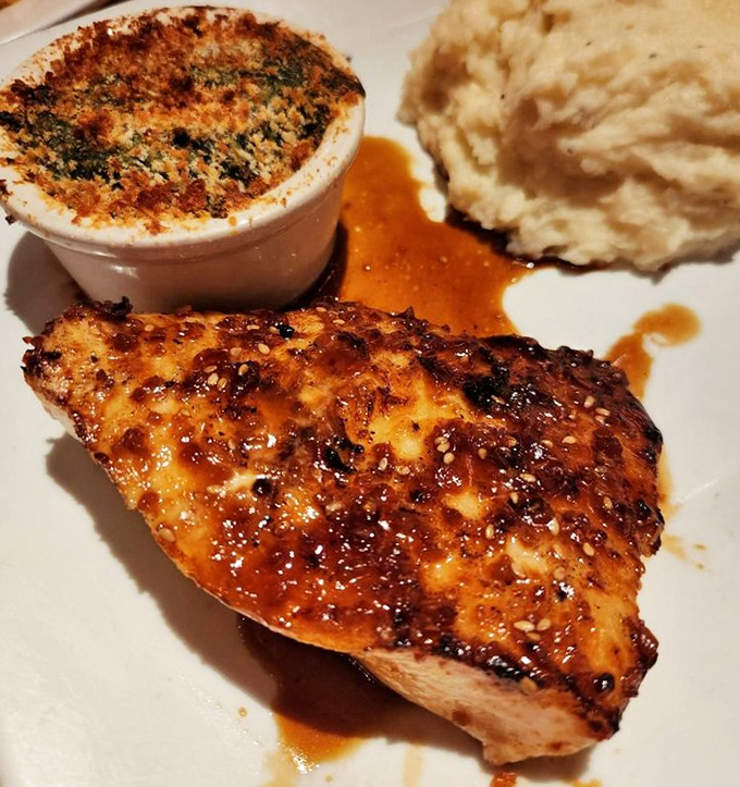 This Chilean Sea Bass wears its caramelized glaze like a designer outfit – elegant, perfectly fitted, and guaranteed to turn heads at the table.