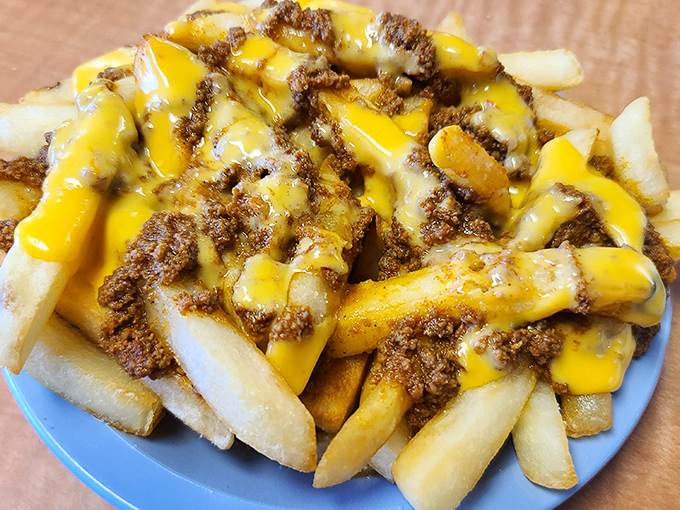 Chili cheese fries: where French fries go to fulfill their destiny. A glorious mountain of comfort that requires both fork and commitment.