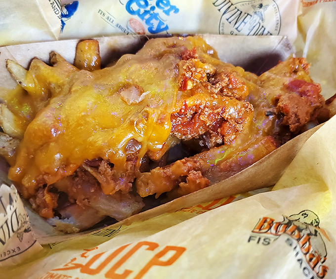 Chili cheese fries that blur the line between side dish and main event. The kind of indulgence that makes diets weep and taste buds rejoice.