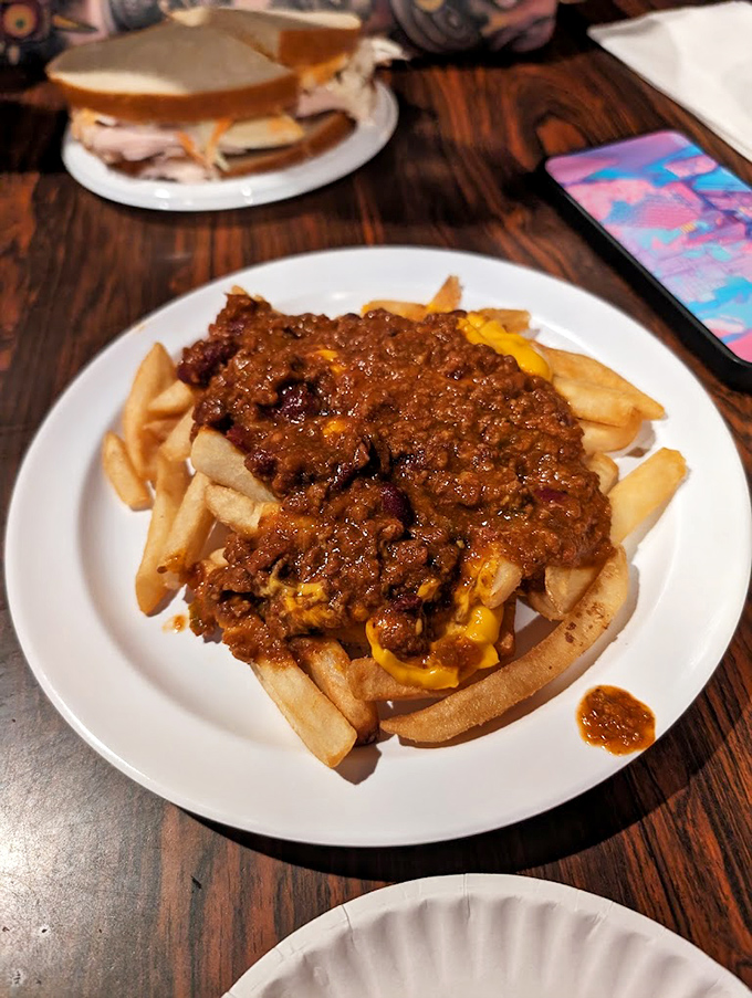 Chili cheese fries that laugh in the face of diet plans. That molten cheese and hearty chili aren't just toppings&mdash;they're a declaration of delicious defiance.