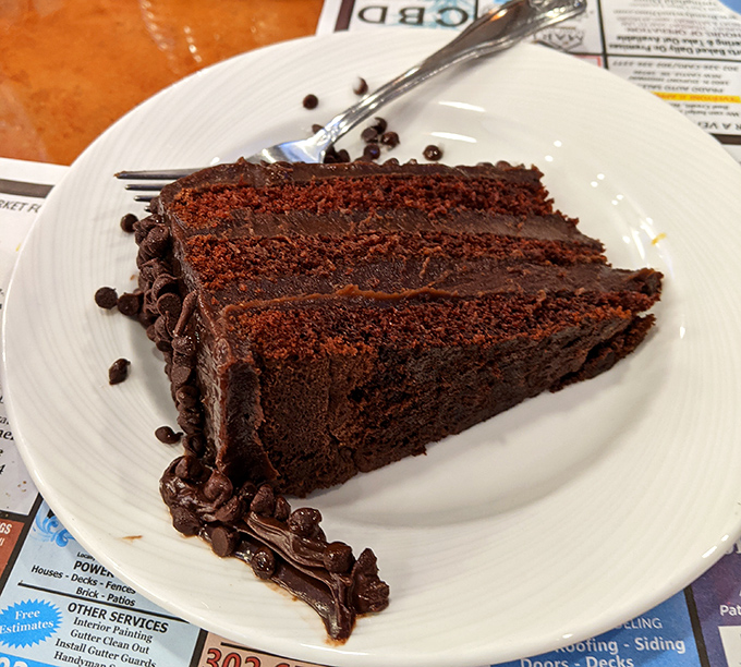 This chocolate cake isn't just dessert&mdash;it's three layers of therapy that doesn't ask about your feelings, just makes them better with each forkful.