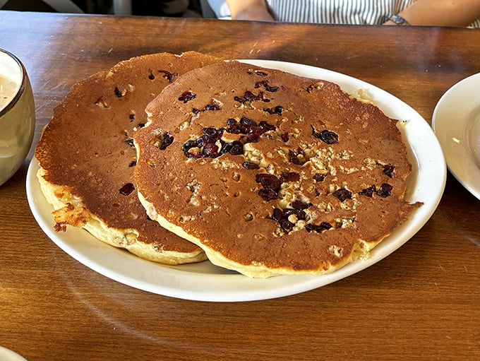 Pancakes studded with chocolate chips and nuts—breakfast's way of saying "today is special" without needing a calendar reason.