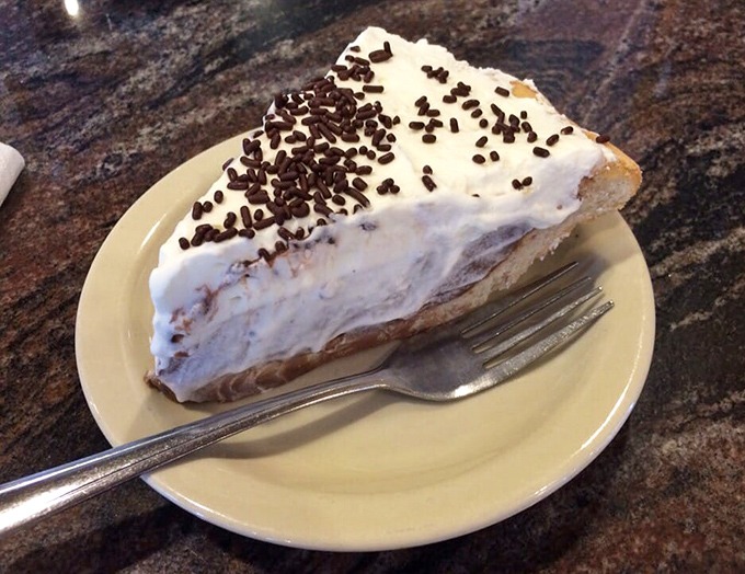 This chocolate cream pie doesn't need fancy garnishes or pretentious plating&mdash;just an honest-to-goodness flaky crust, silky filling, and a mountain of real whipped cream.