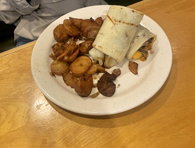 Wrapped like a present and served with golden potatoes, this chorizo burrito delivers a morning fiesta that makes hitting the snooze button seem like a crime.