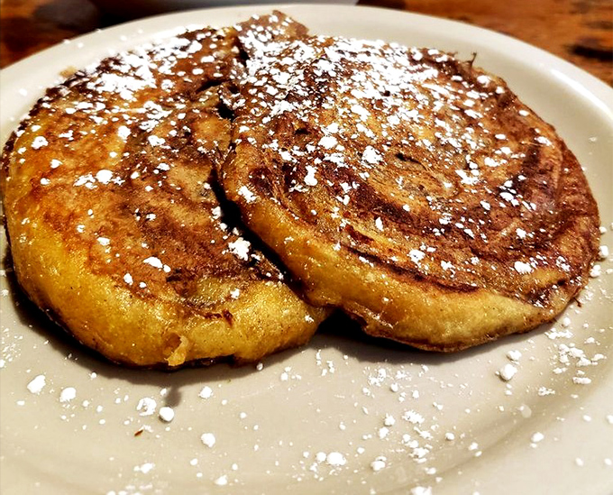 French toast that makes you wonder if regular bread ever had a chance. Dusted with powdered sugar like the first perfect snowfall of winter.