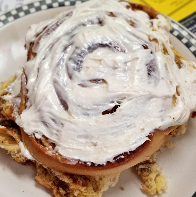 A cinnamon roll that doesn't understand the concept of moderation. The frosting alone could qualify as a food group.