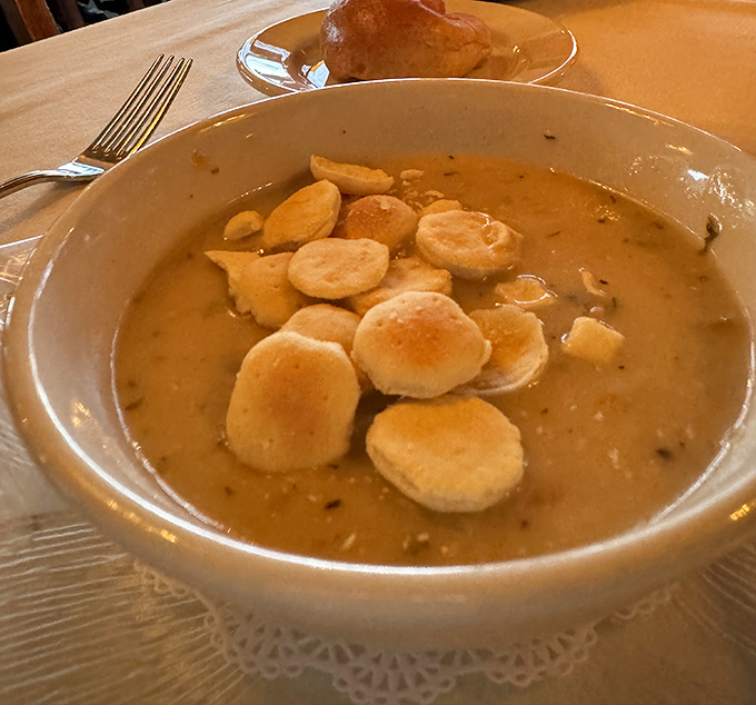 This isn't just clam chowder &ndash; it's a warm hug in a bowl, complete with those adorable oyster crackers floating like little life preservers.
