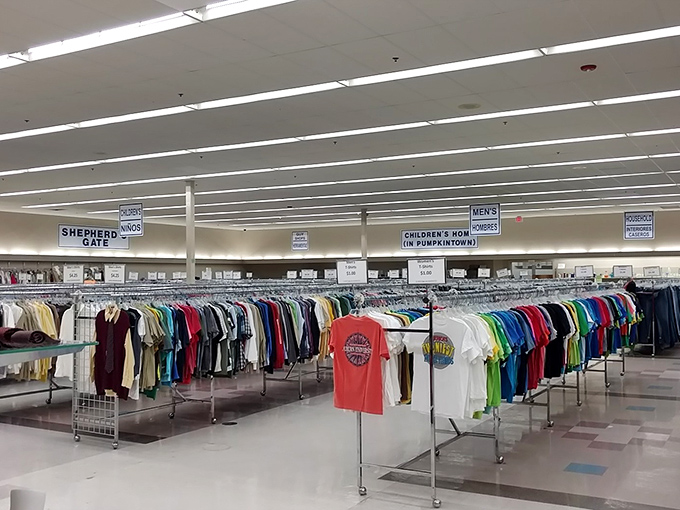A rainbow coalition of second-hand possibilities, where each hanger might hold the vintage Hawaiian shirt of your dreams. 