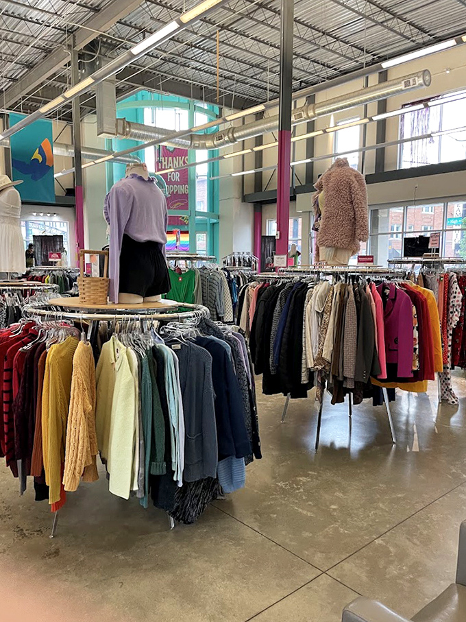 The rainbow of sweaters and tops might have you wondering if you've stumbled into a department store rather than a thrift shop. Organization makes all the difference!