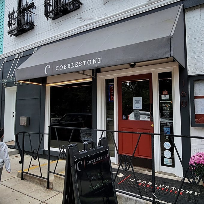 Cobblestone restaurant's understated elegance belies its culinary ambitions, with a doorway that promises sophisticated flavors in a town that appreciates the finer things.