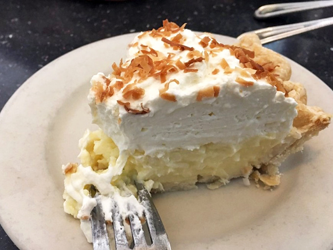 Coconut cream pie that would make your grandmother both proud and jealous. That mountain of whipped cream and toasted coconut flakes is worth saving room for.