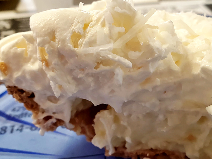 This coconut cream pie doesn't just have height&mdash;it has ambition. A skyscraper of whipped cream and coconut that demands to be photographed before demolished.