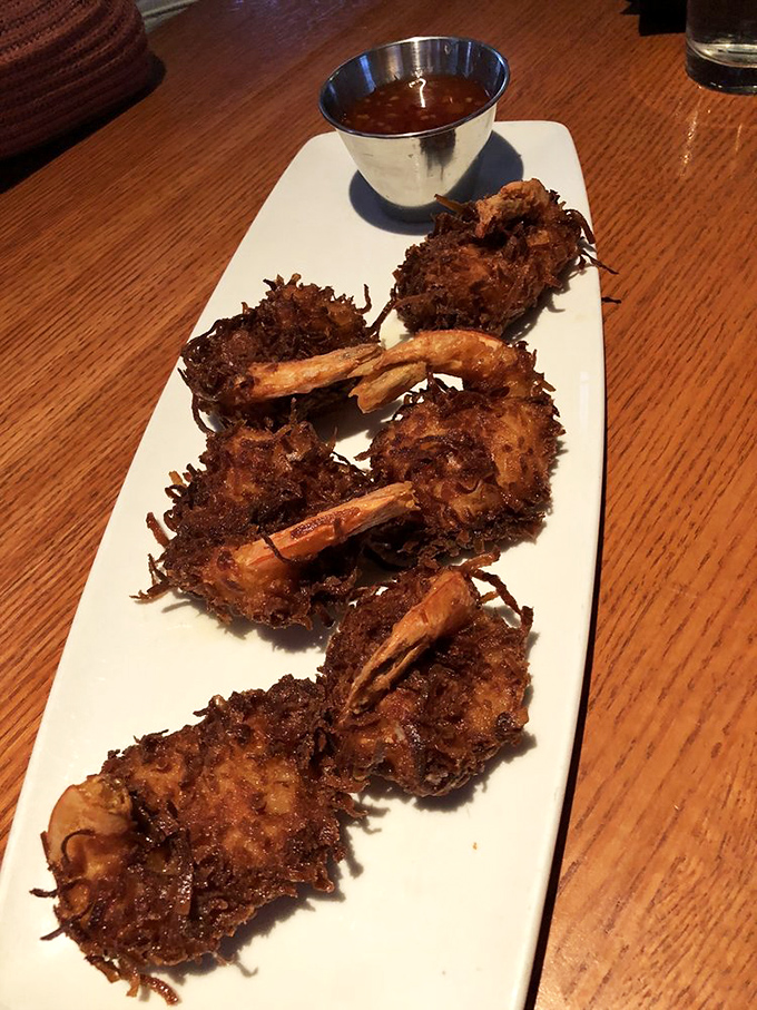 Coconut shrimp that would make a tropical island jealous. The crispy exterior gives way to succulent shrimp&mdash;a textural masterpiece worth every calorie.