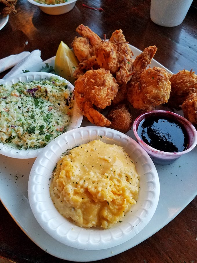 Golden coconut shrimp with creamy sides that would make even mermaids swim to shore. The perfect balance of sweet exterior and savory interior.