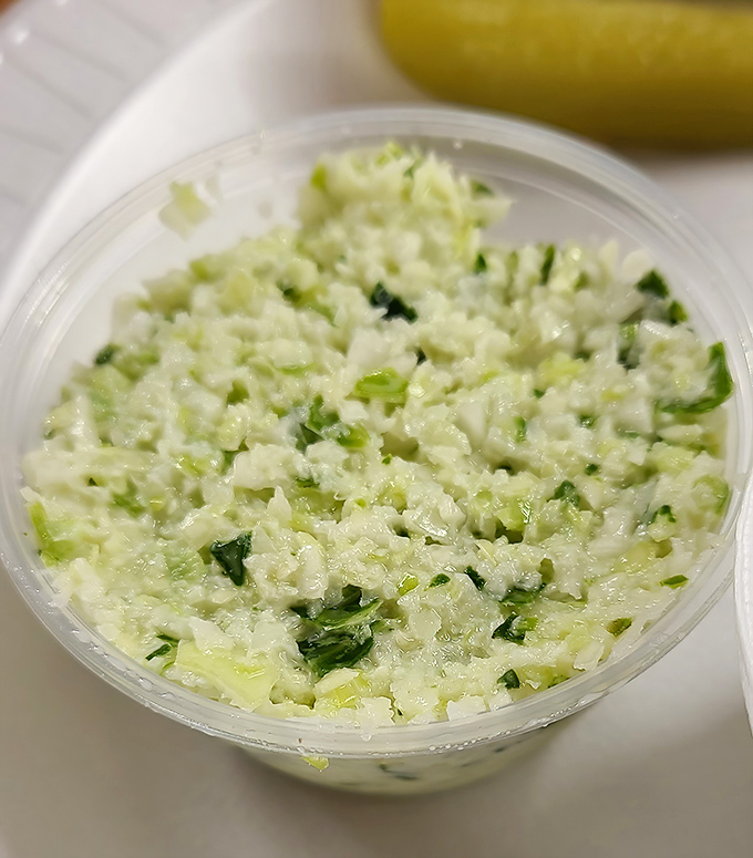 This isn't just coleslaw; it's the cool, crisp counterpoint that cuts through rich barbecue like a refreshing breeze on a Georgia summer day.