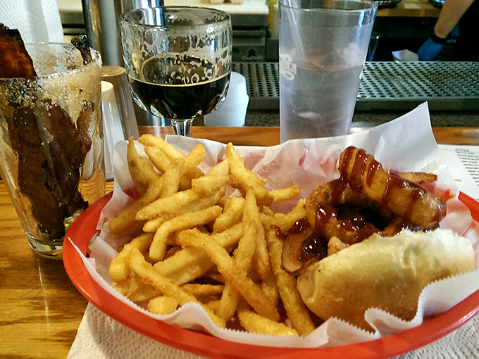 The holy trinity: cold beer, golden fries, and a glistening hot dog. Some combinations are simply written in the stars.