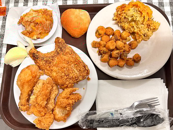 A tray that answers the eternal question: "Why choose one Southern delicacy when you can have them all?" Fried chicken leads this delicious democracy.