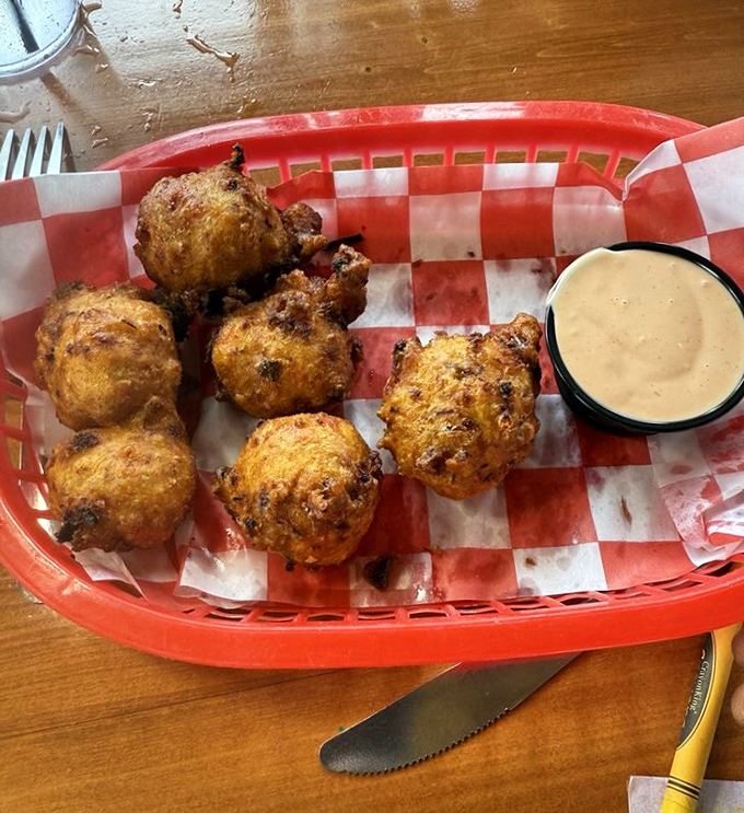 Conch fritters golden-fried to perfection&mdash;little hush puppies of the sea that deliver a taste of the Bahamas with every bite.