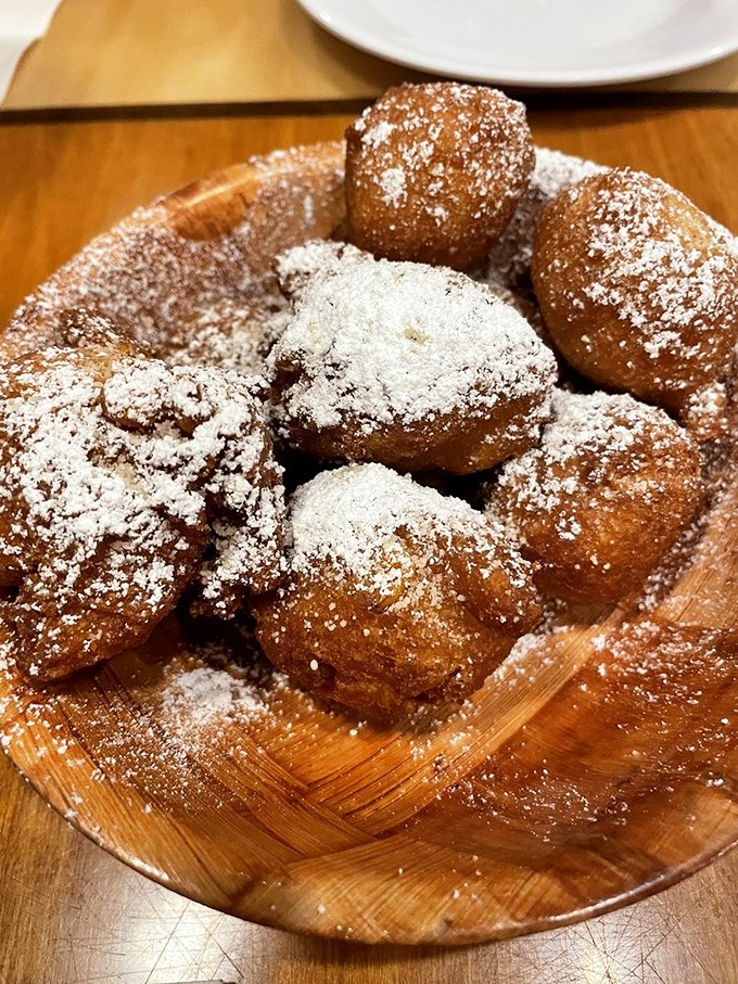 These powdered sugar-dusted corn fritters aren't just dessert&mdash;they're little orbs of joy that make you wonder why you ever wasted calories elsewhere.