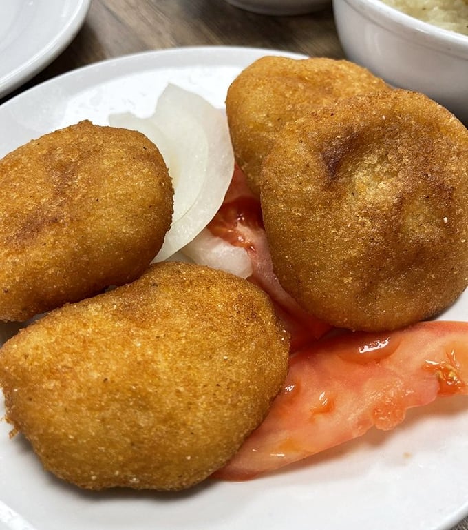 These golden discs of cornbread aren't just side dishes&mdash;they're essential tools for sopping up every last drop of gravy.