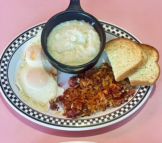 Crispy corned beef hash with sunny-side-up eggs and grits&mdash;the breakfast equivalent of hitting three cherries on a slot machine.