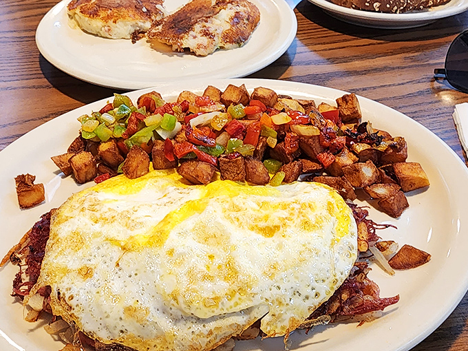 A proper diner hash&mdash;where potatoes, peppers, and eggs unite in a breakfast symphony that Mozart himself would have composed had he been a short-order cook.