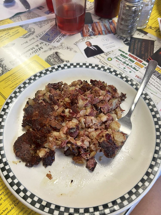 Corned beef hash so loaded with crispy potatoes, it practically requires its own zip code on the plate.