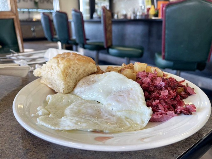 Corned beef hash with eggs and a biscuit: breakfast of champions or hangover cure? The correct answer is "yes, please."