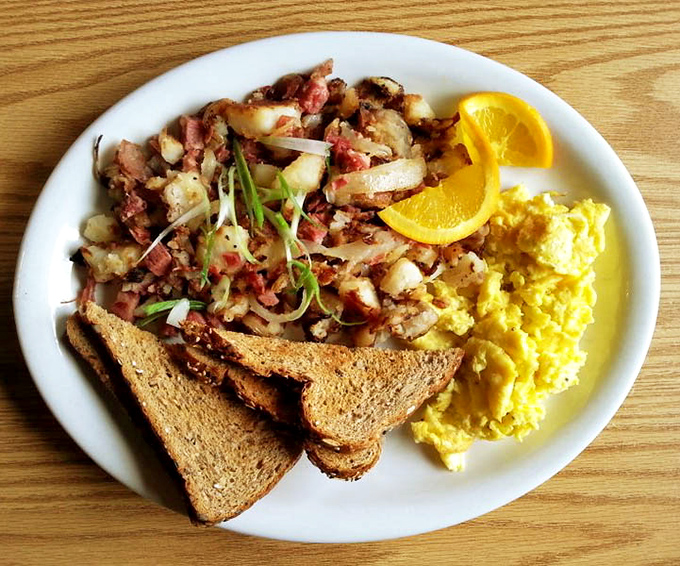 The corned beef hash—crispy edges, tender centers—is the breakfast equivalent of finding an extra $20 in your winter coat pocket.