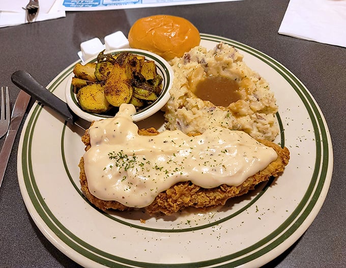 Country-fried steak smothered in gravy&mdash;when your cardiologist isn't looking but your soul needs immediate comfort.
