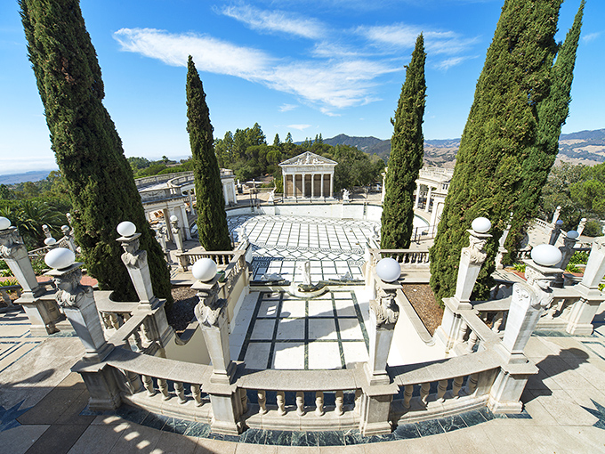 Classical columns frame this stunning terrace view, creating the perfect stage for contemplating life's big questions or just showing off to your friends.
