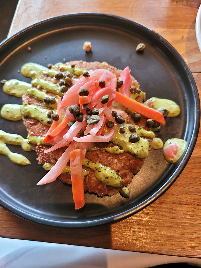 A crab cake that doesn't hide behind fillers&mdash;just pure, unadulterated seafood goodness with pickled vegetables for contrast.