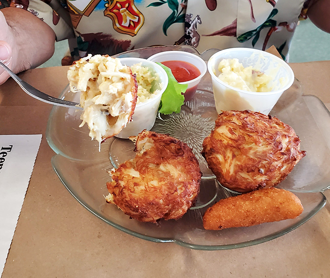 These golden-fried crab cakes contain more actual crab than filler&mdash;a rare and beautiful thing in today's world. That's not cooking; that's respect.