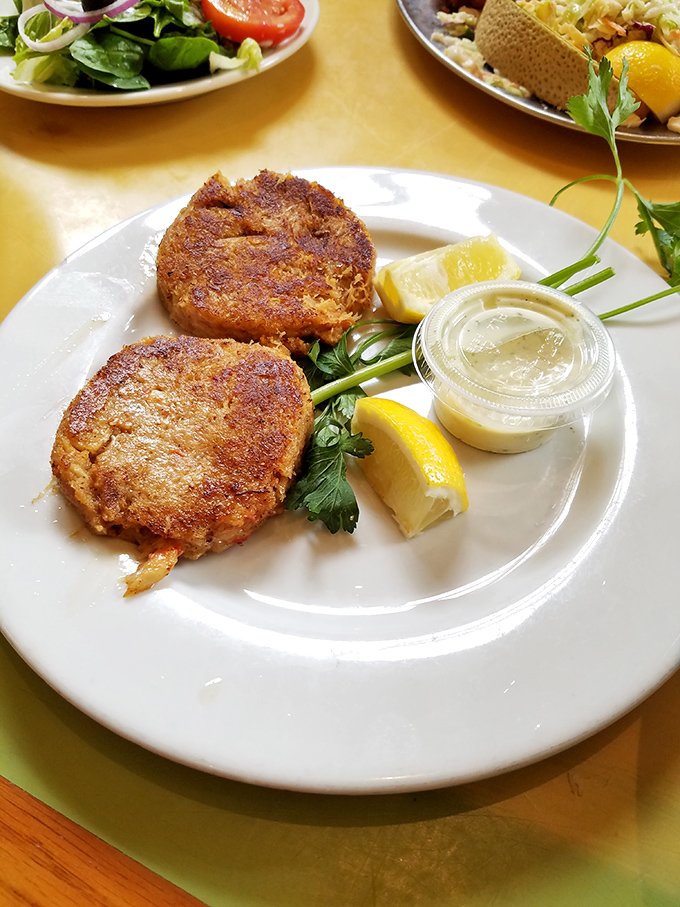 Golden-brown crab cakes that crackle with each bite, revealing sweet, tender crab meat within. Simplicity that lets the star ingredient shine.