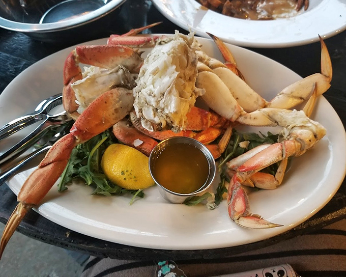 This crab isn't just served—it's presented like the seafood royalty it is, complete with drawn butter for the coronation ceremony.