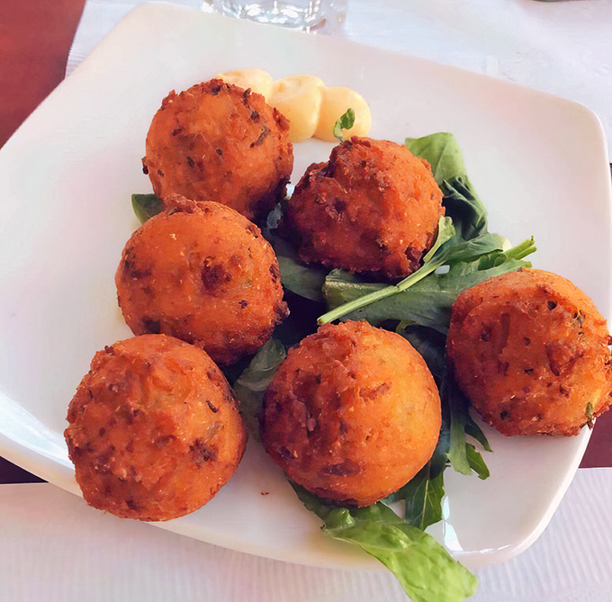 Hushpuppies that speak volumes&mdash;crispy spheres of cornmeal joy that might just be worth the drive to Erie alone.
