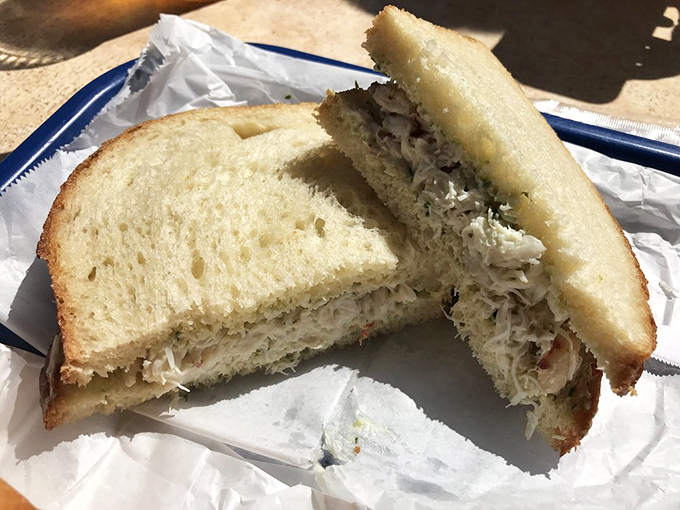 Crab sandwich simplicity: sweet meat, minimal filler, fresh bread. Sometimes the best things in life require no explanation.