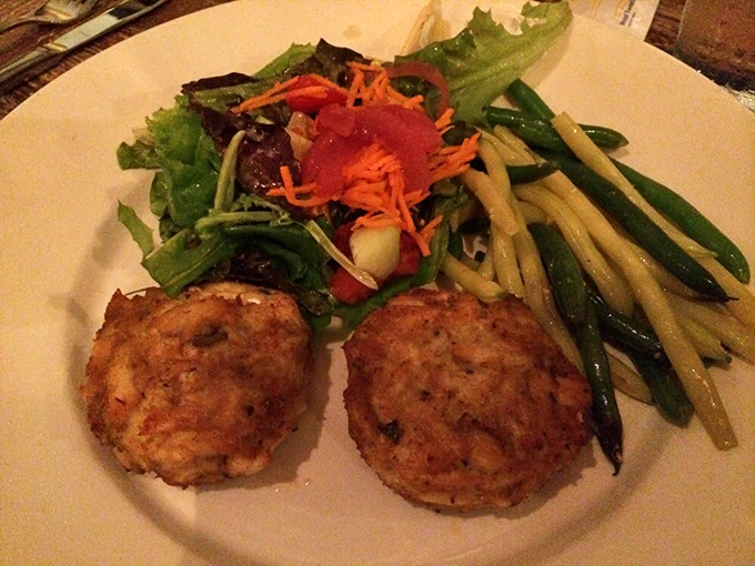 These golden-brown crab cakes aren't just appetizers&mdash;they're little discs of Delaware happiness served with seasonal vegetables.