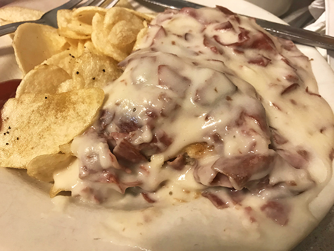 Cream chipped beef with home fries&mdash;what your grandparents called "S.O.S." and what comfort food dreams are still made of.