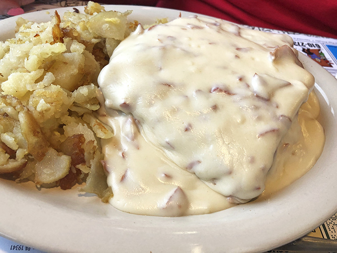 The holy grail itself&mdash;creamed chipped beef cascading over potatoes like a savory waterfall, transforming humble ingredients into comfort food royalty.