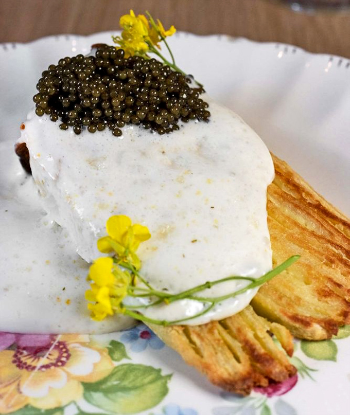 Elegant presentation meets comfort food in this stunning crepe cake that defies all dining expectations beautifully.