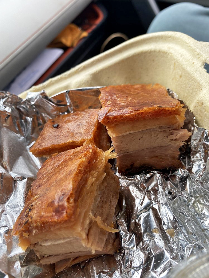 Pork belly that's achieved the barbecue trifecta: crispy exterior, rendered fat, and meat so tender it practically surrenders at first bite.