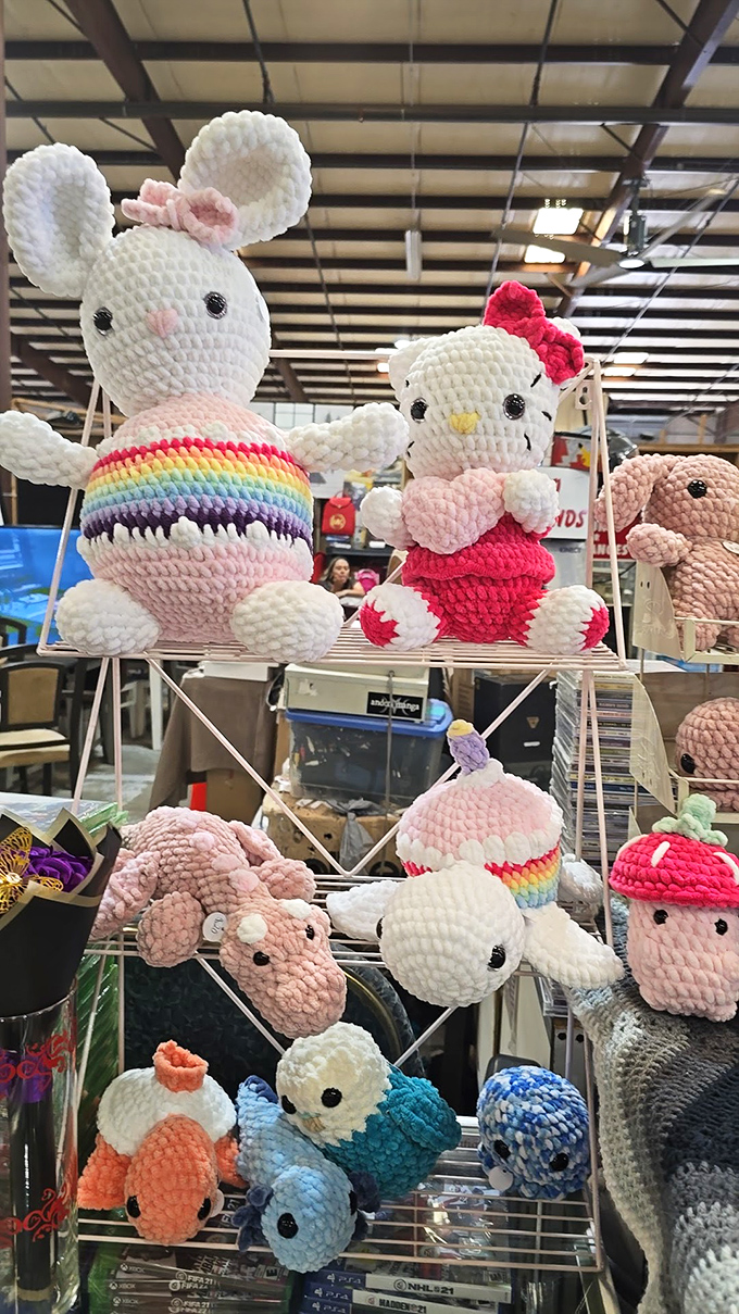 Crocheted creatures with button eyes stand guard over their plush kingdom. That rainbow bunny has seen things, my friends.