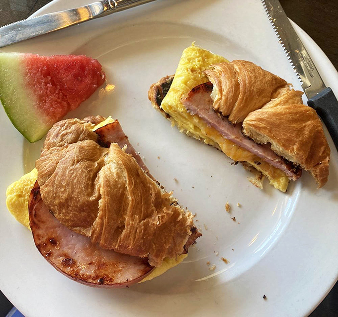 When croissants meet breakfast sandwiches, magic happens between those buttery, flaky layers.