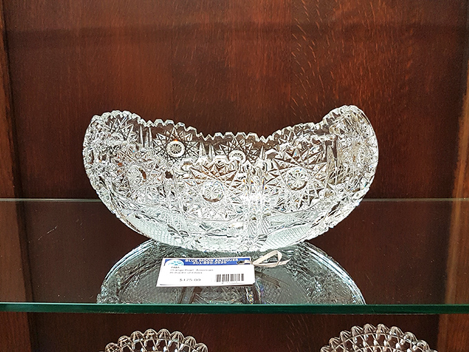 Crystal bowls that once graced the tables of America's past now hold blue ornaments, proving everything old becomes new again with a little imagination.