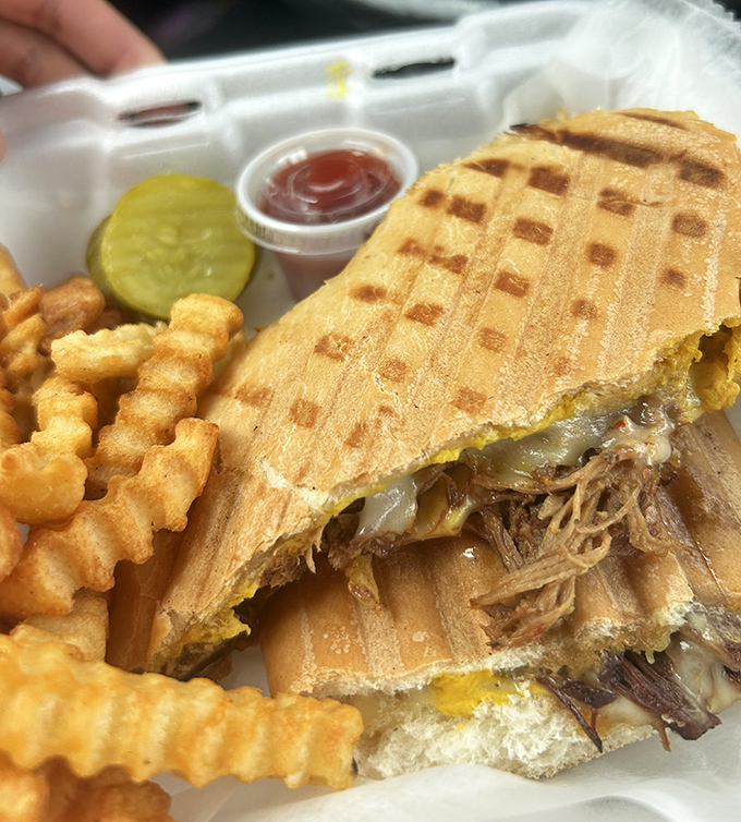 This Cuban sandwich isn't just pressed&mdash;it's been persuaded into a state of crispy, meaty, pickle-punctuated perfection. Worth every delicious calorie.