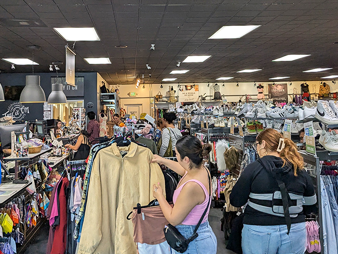 Shoppers browse with the focused intensity of archaeologists, each hoping to unearth that perfect fashion fossil before someone else spots it.